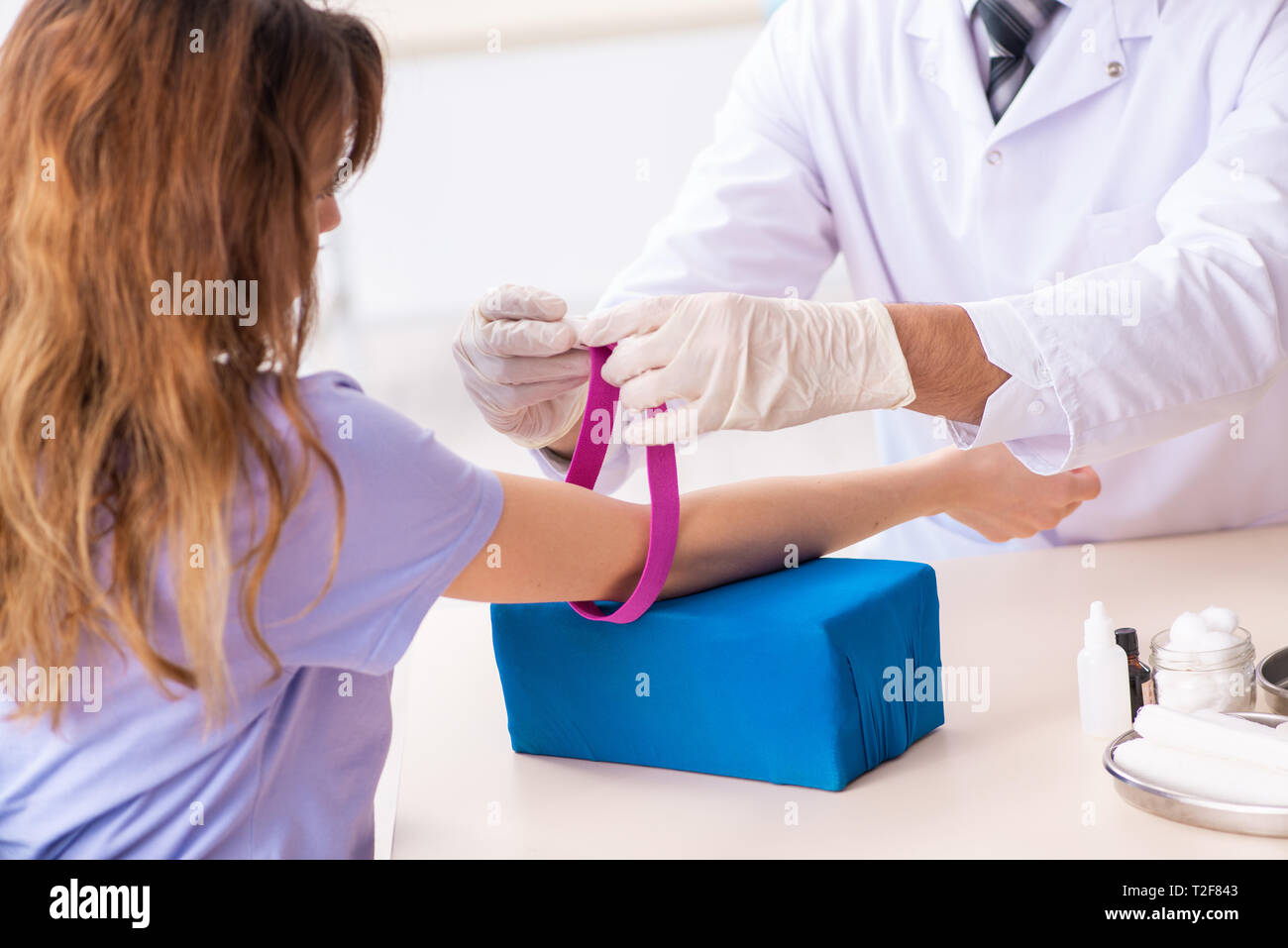 Female patient during blood test sampling procedure Stock Photo - Alamy