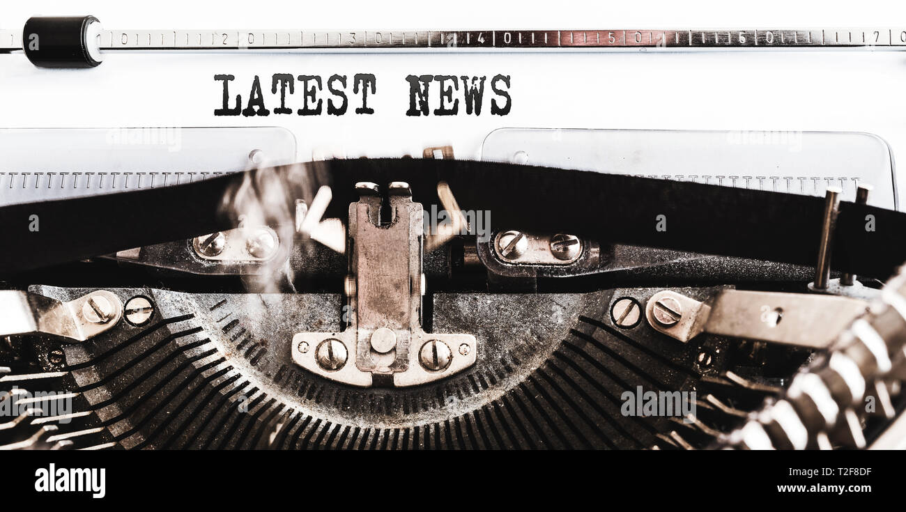 close-up of words LATEST NEWS written on old manual typewriter Stock ...