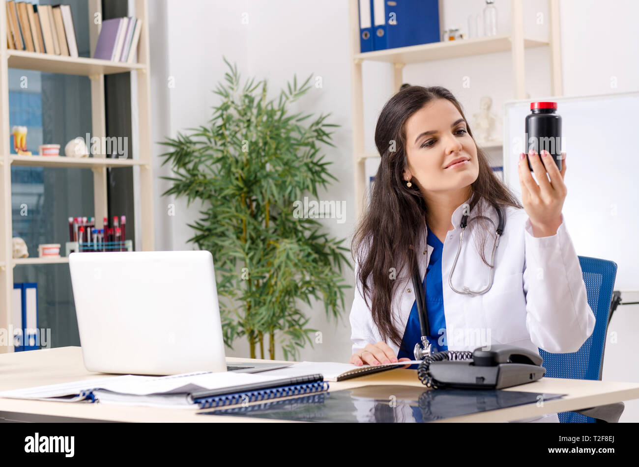 Happy doctor looking container hi-res stock photography and images - Alamy