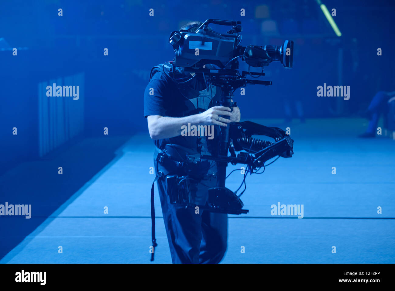 Steadicam man working at the shooting pavilion Stock Photo - Alamy