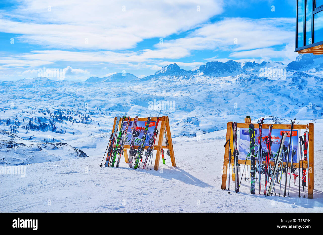 OBERTRAUN, AUSTRIA - FEBRUARY 21, 2019: The ski stands on the slope of ...
