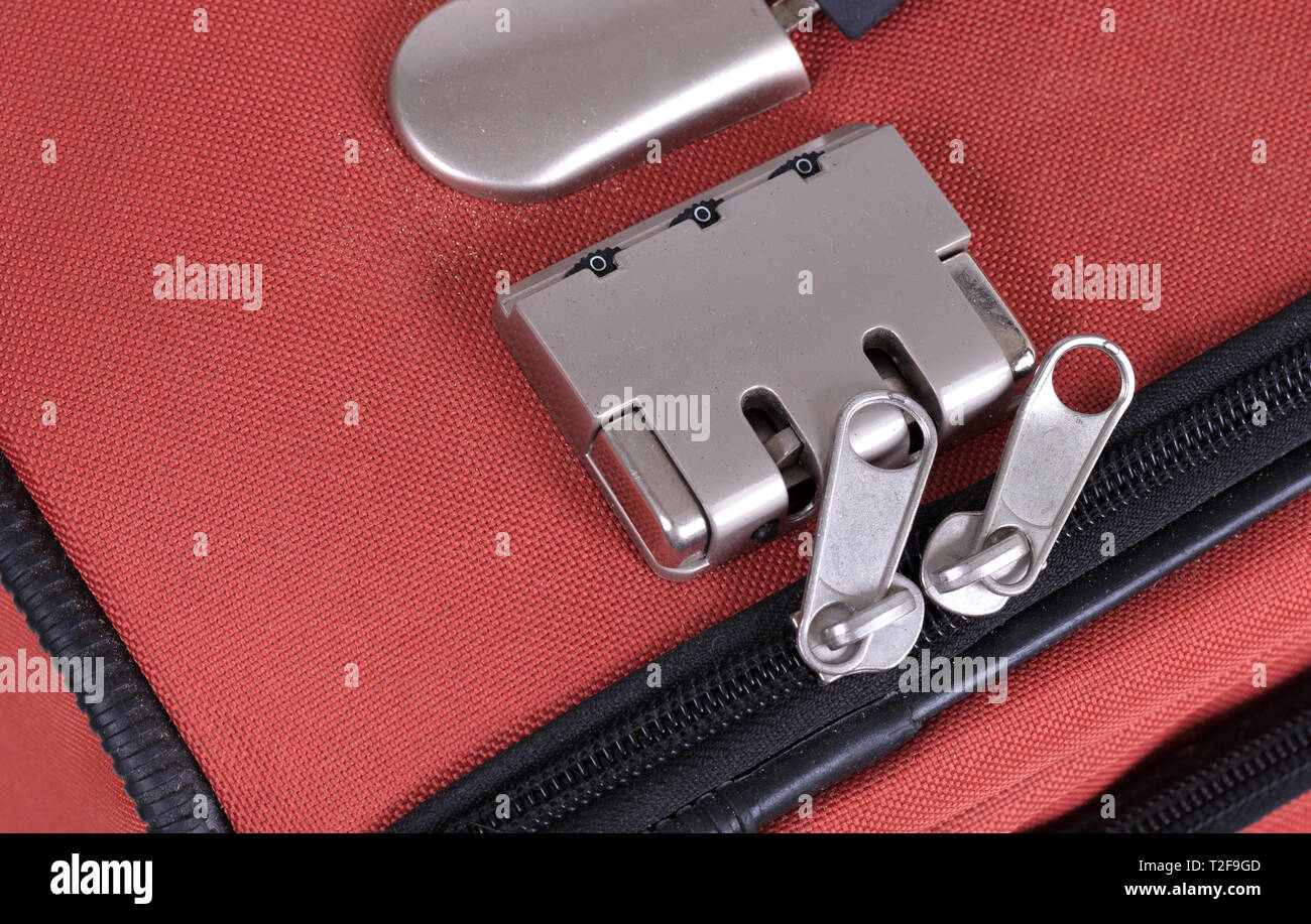 Combination lock on suitcase travel bag. Number, steel - Red bag Stock ...