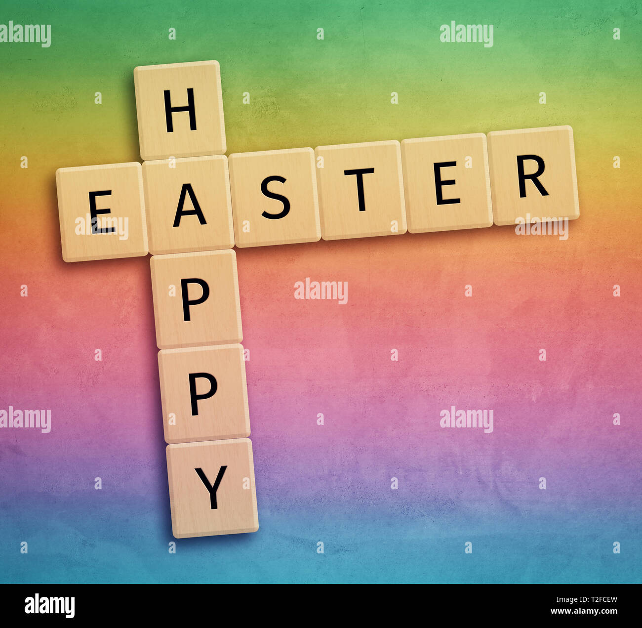Happy easter tiles on colorful textured background, flat lay Stock ...