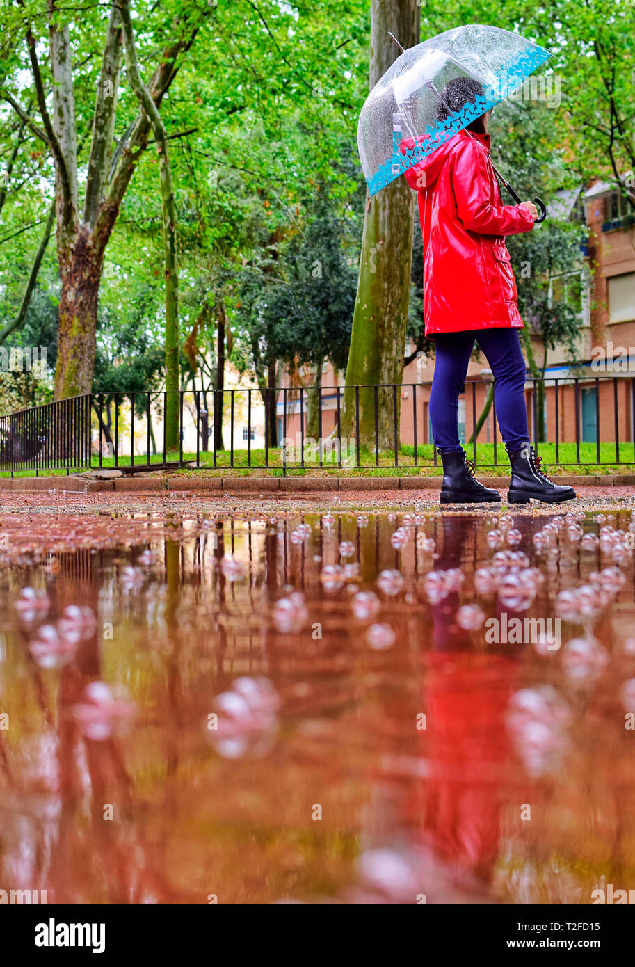 Girl Walking Alone In The Rain