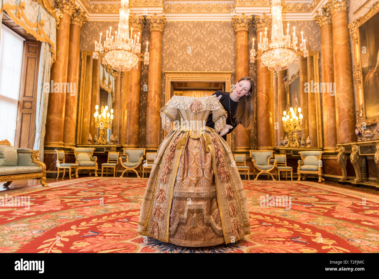 London Uk 2 April 2019 A Curator Poses With Queen Victorias Stuart