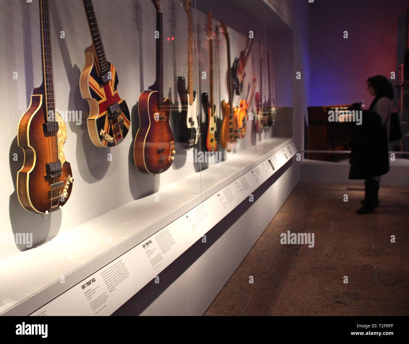 New York, USA. 01st Apr, 2019. A visitor visits guitars in the ...