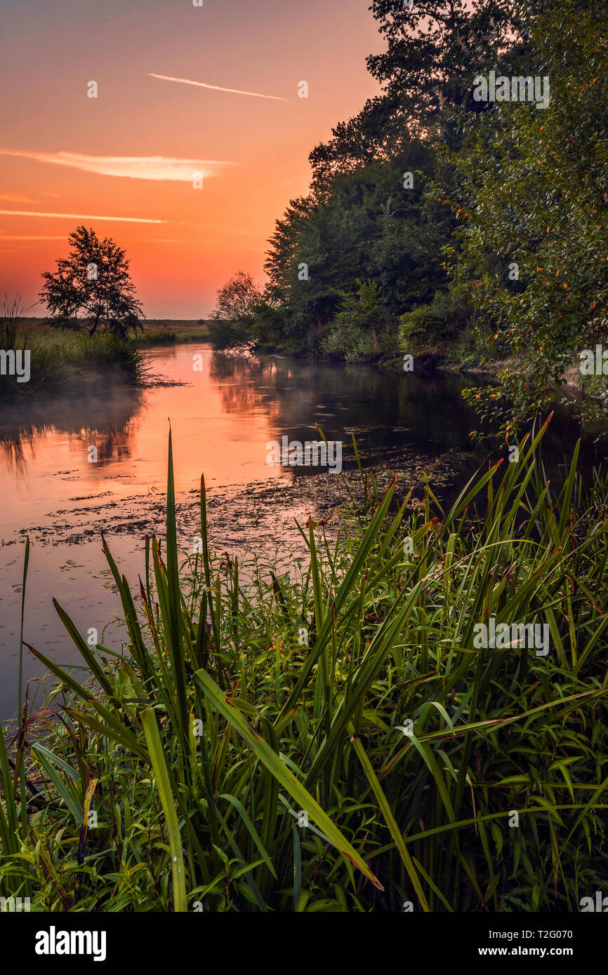 Beautiful morning on a river meander in a natural landscape with some ...