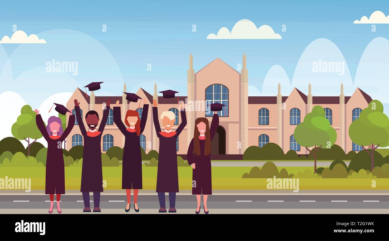 group of mix race students in gown throwing graduation caps in the air ...