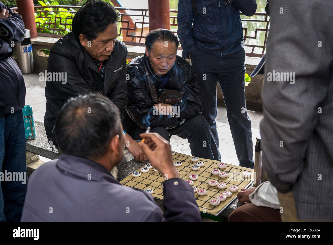 Locals playing Go, a popular Chinese board game, in the Green Lake Park ...