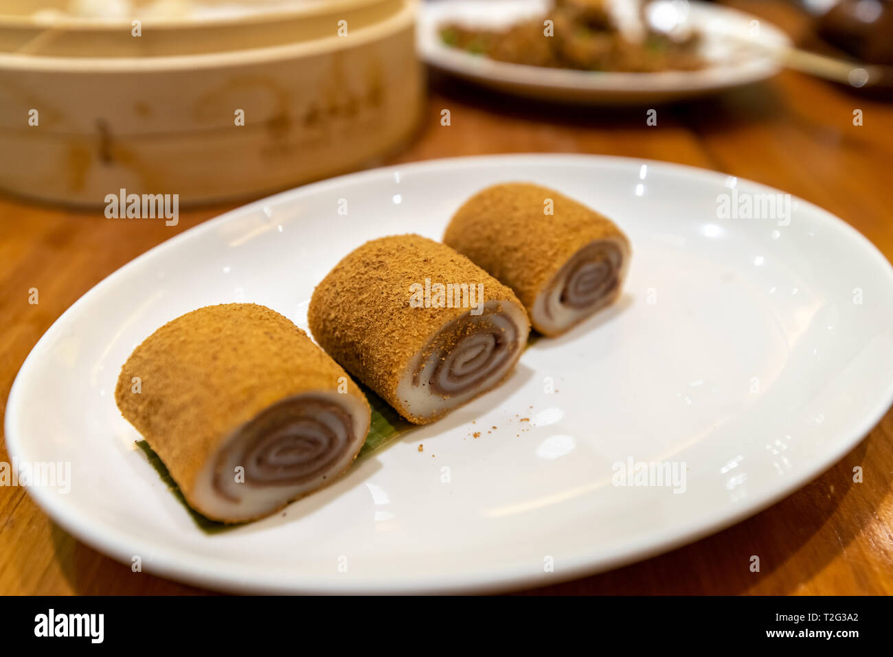 Chinese style desert Red bean roll cake , Philippines Stock Photo - Alamy