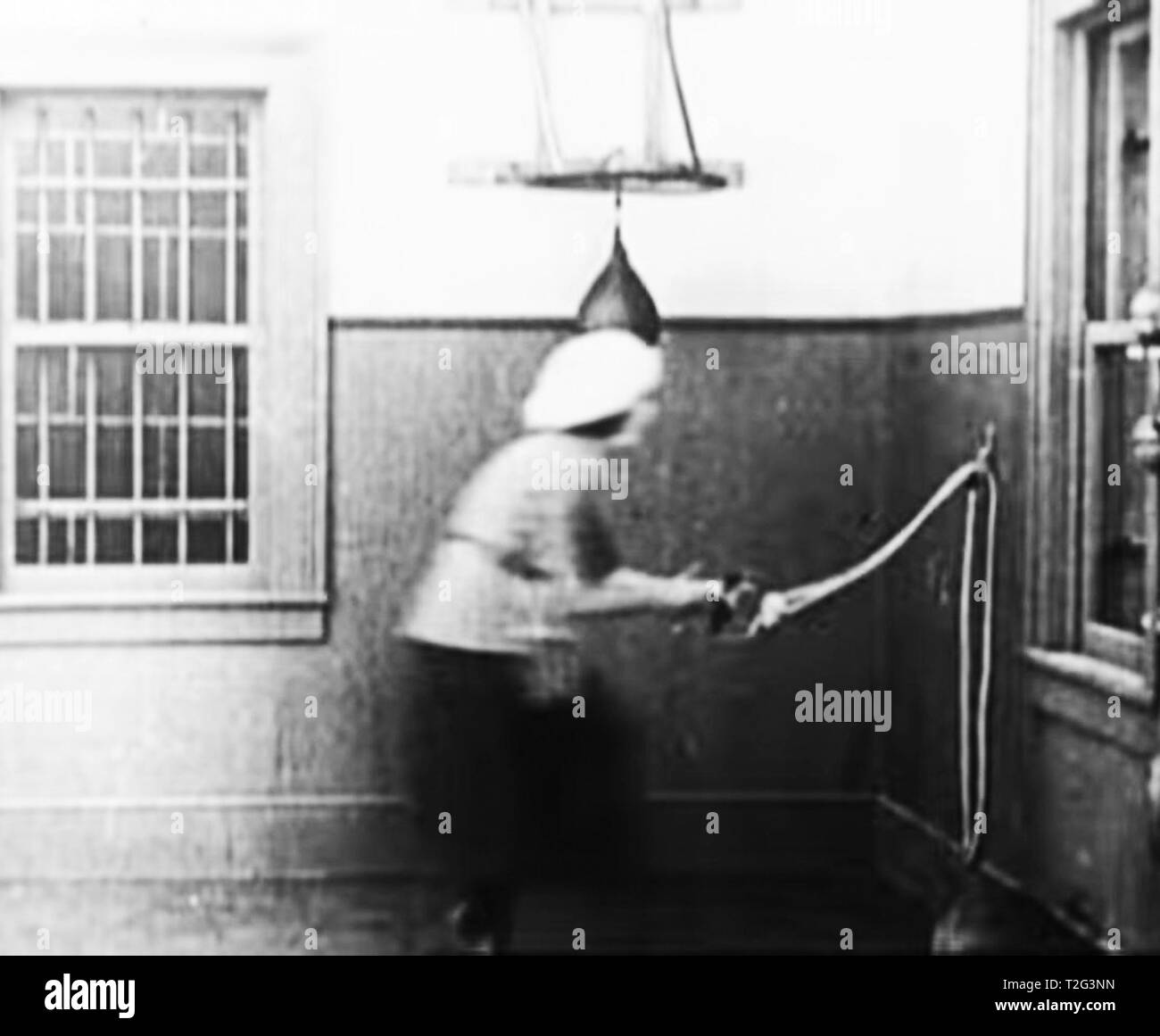 woman tying a rope Stock Photo - Alamy