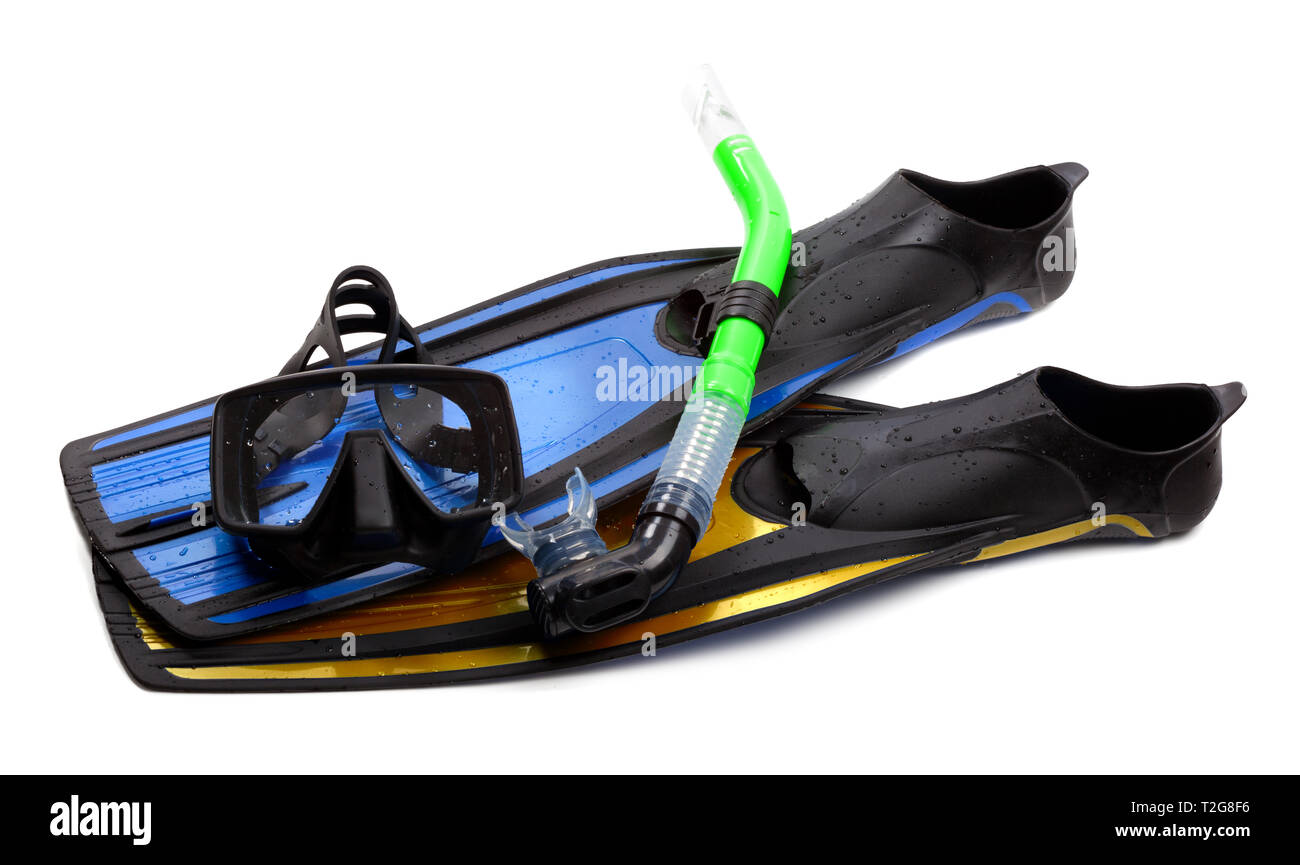 Mask, snorkel and swim flippers of different colors with water drops ...
