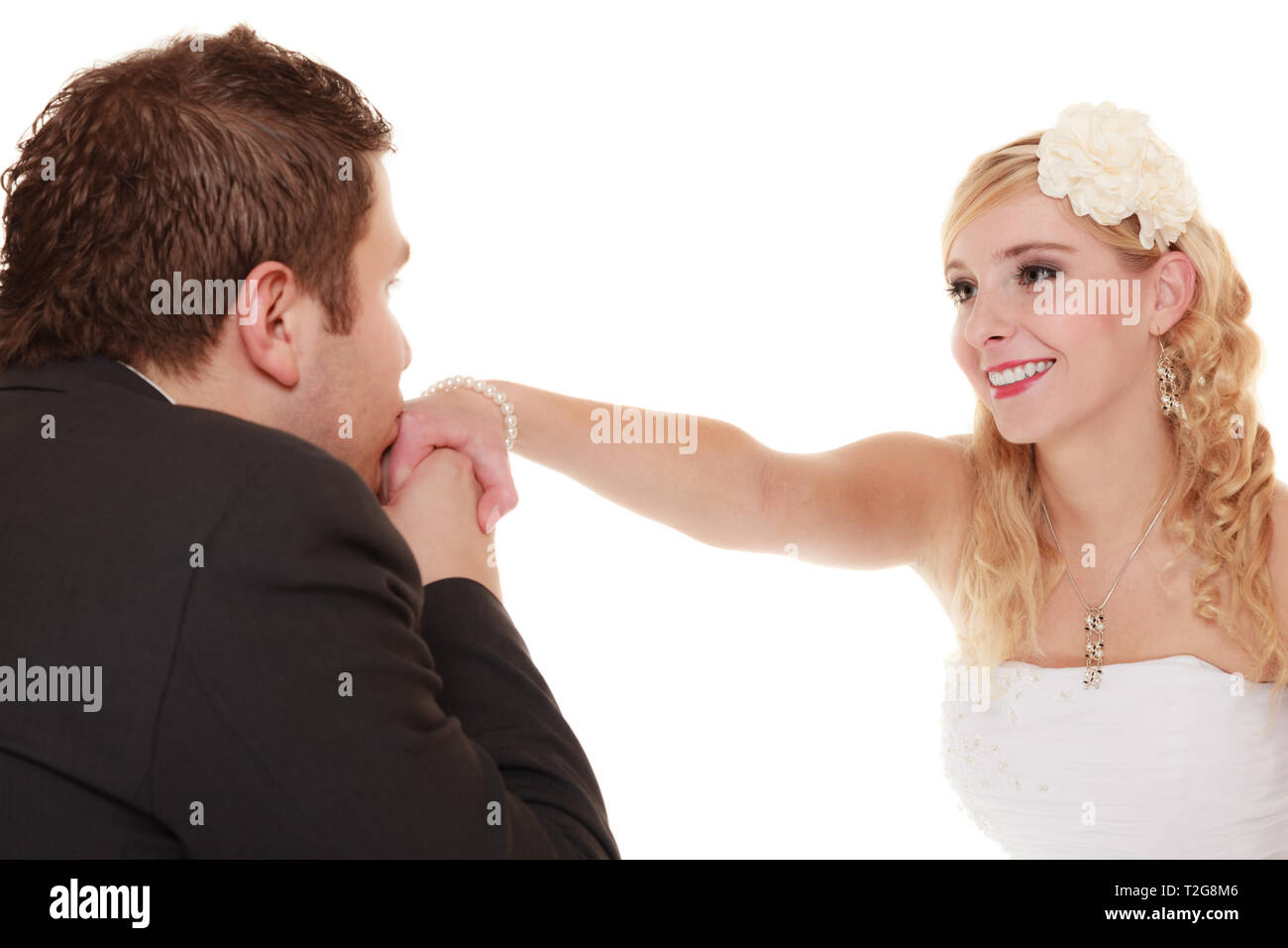 Wedding day. Male groom kissing hand of female bride isolated on white ...
