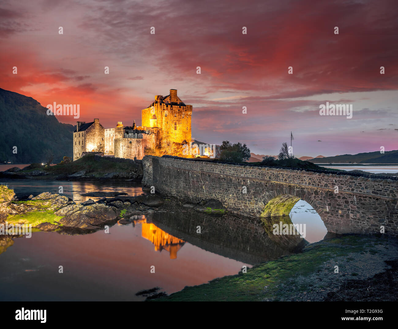 The Eilean Donan Castle with colorful sunset, Highlands of Scotland ...