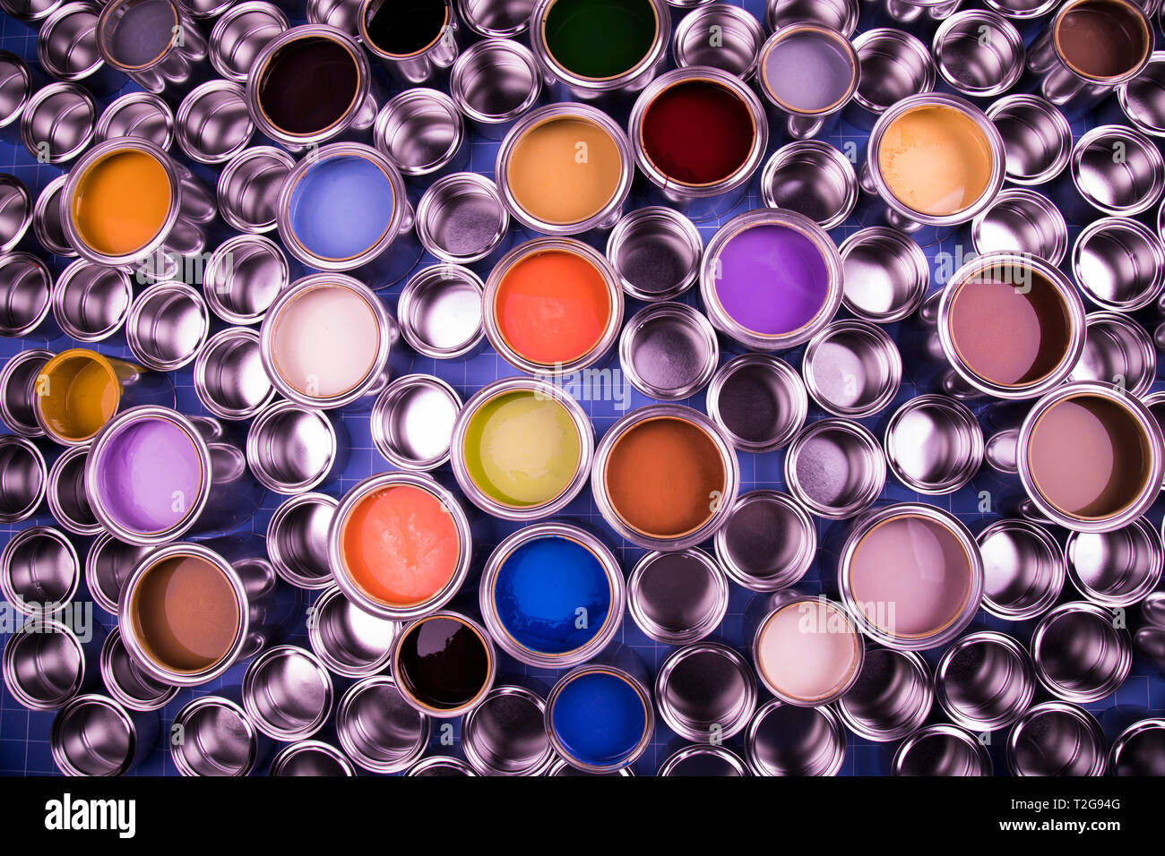 Concept group of tin metal cans with color paint Stock Photo - Alamy