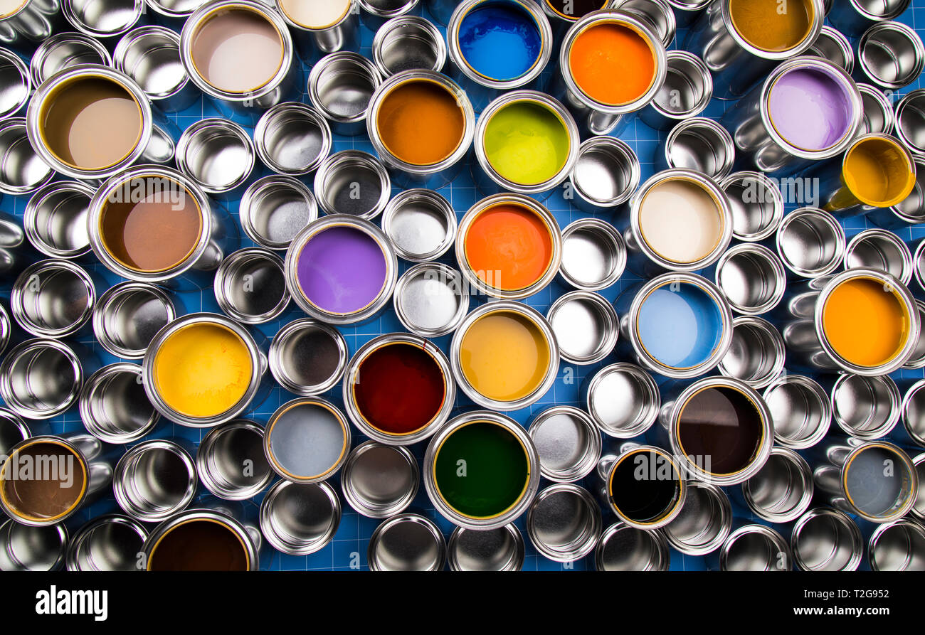 Concept group of tin metal cans with color paint Stock Photo - Alamy