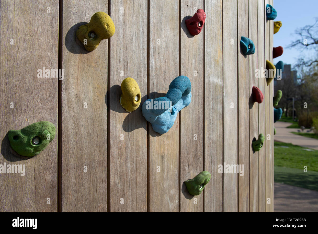 Climbing wall in children's playground Stock Photo - Alamy