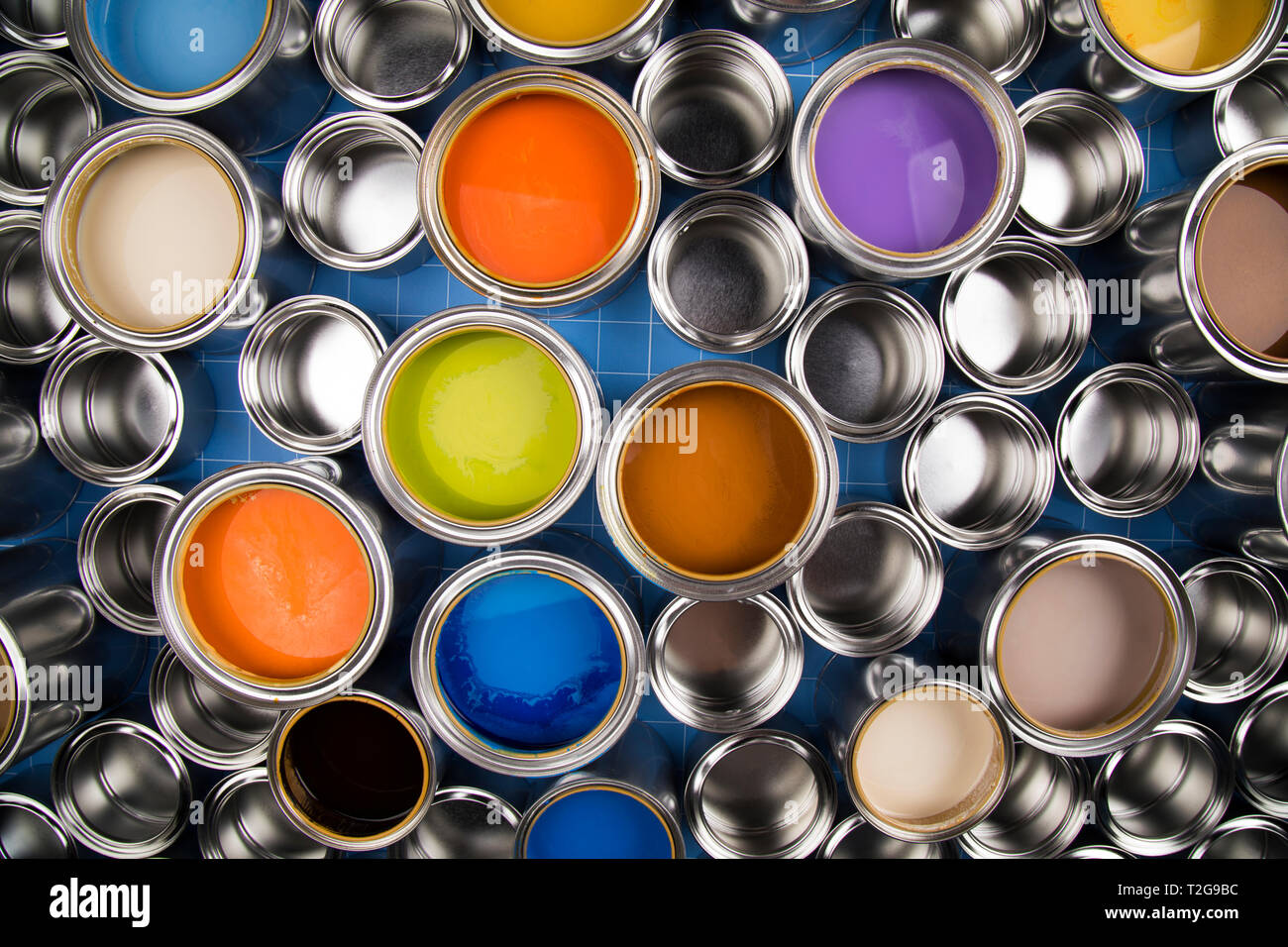 Metal cans with color paint Stock Photo - Alamy