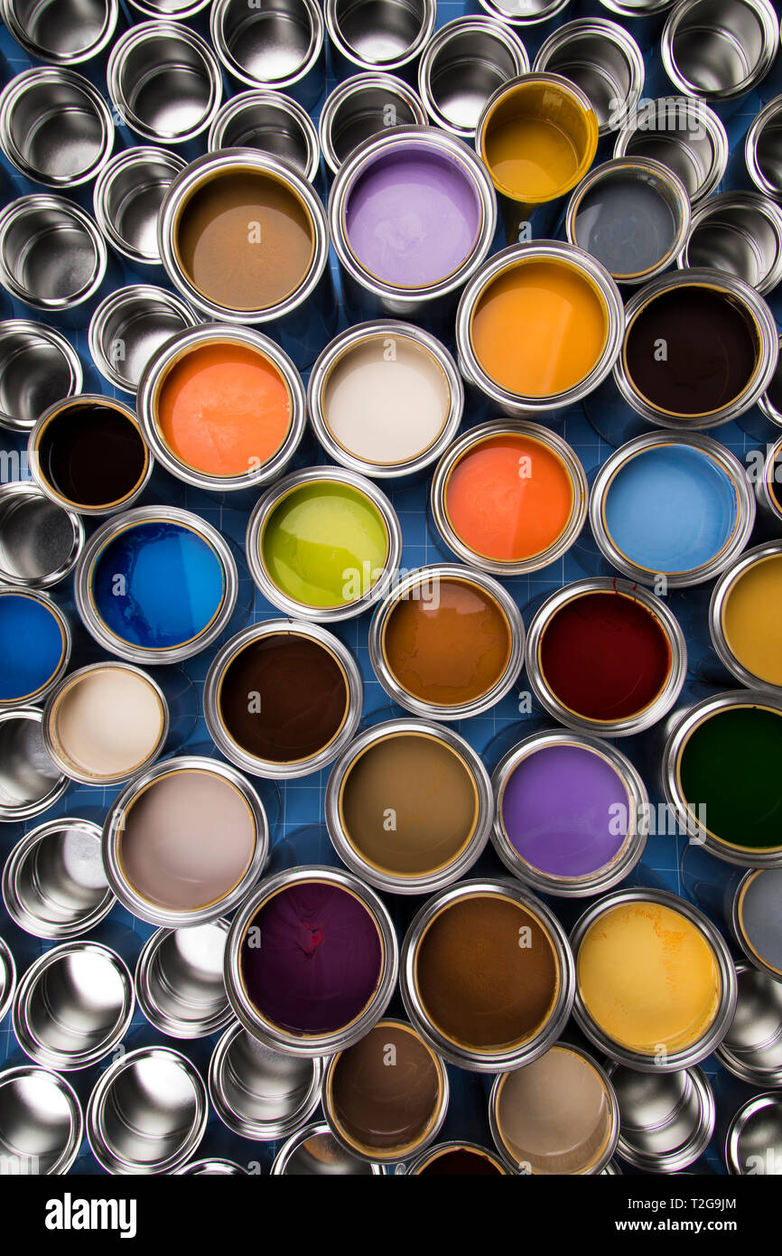 Metal cans with color paint Stock Photo - Alamy