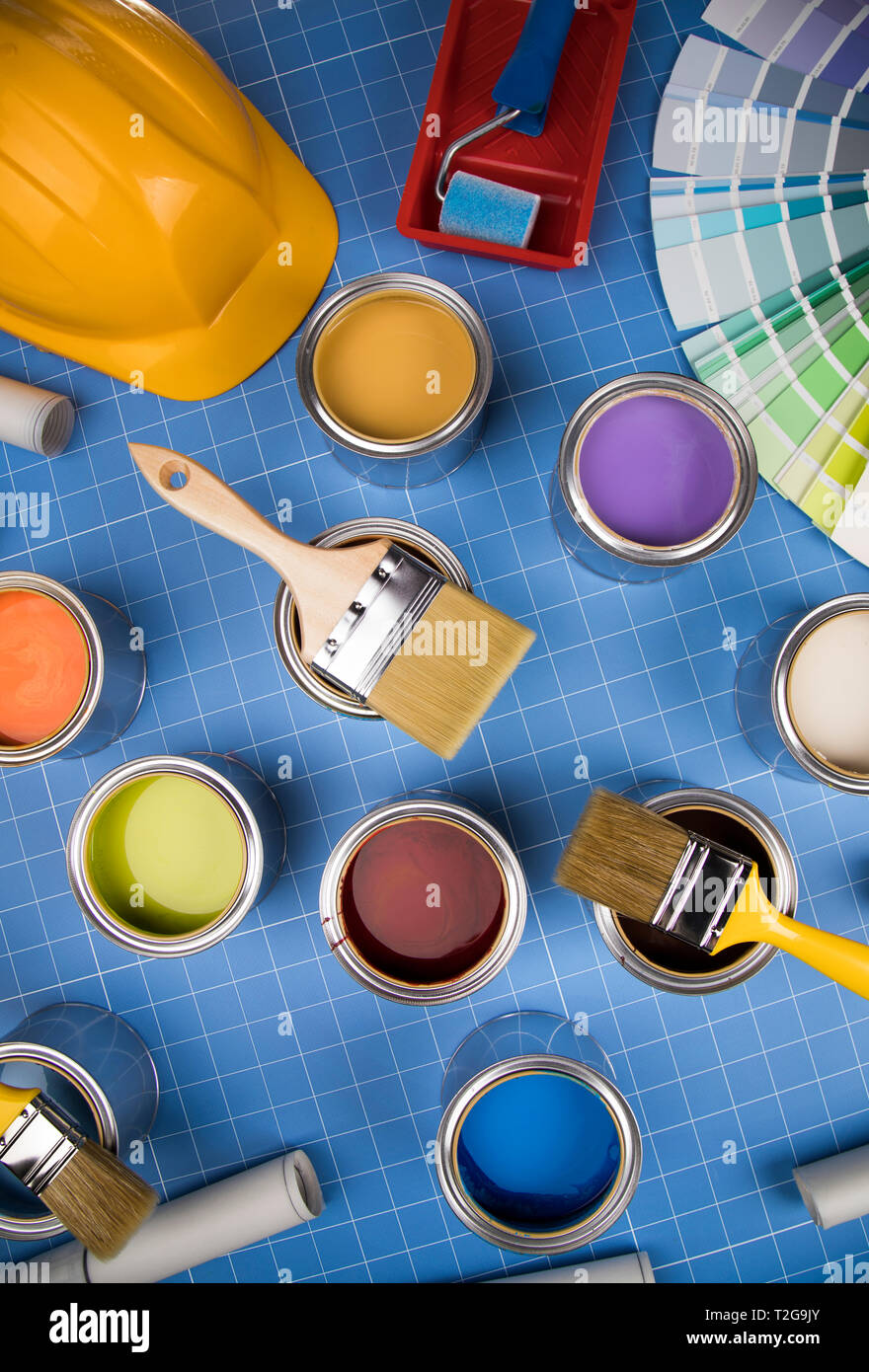 Paint brush, tin can and color guide samples, blue background Stock ...