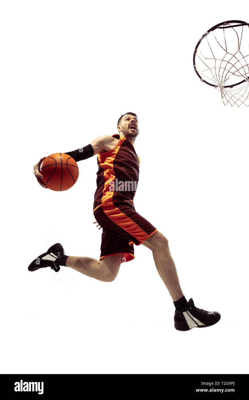 Full length portrait of a basketball player with ball isolated on white ...