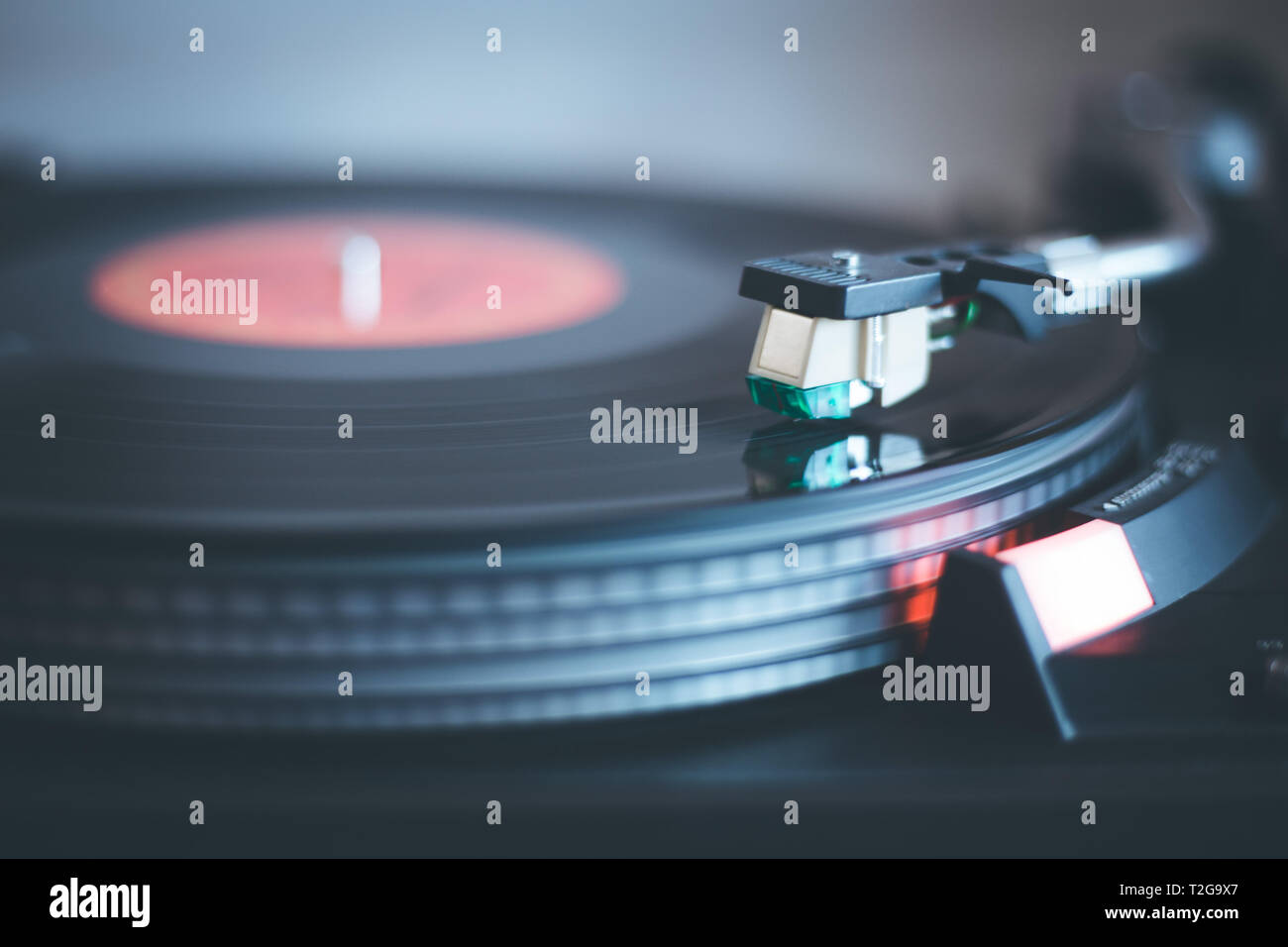 Close up picture of a record player, playing a record Stock Photo - Alamy