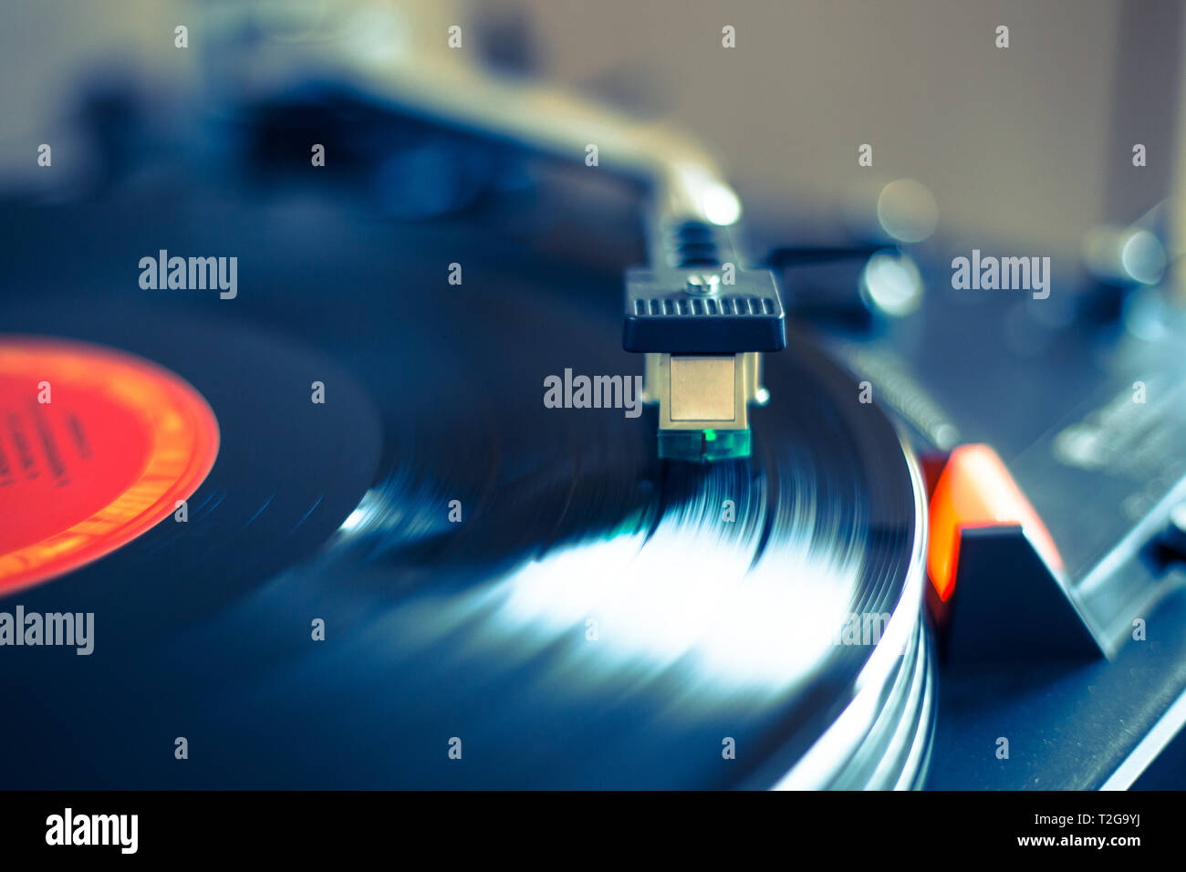 Close up picture of a record player, playing a record Stock Photo - Alamy