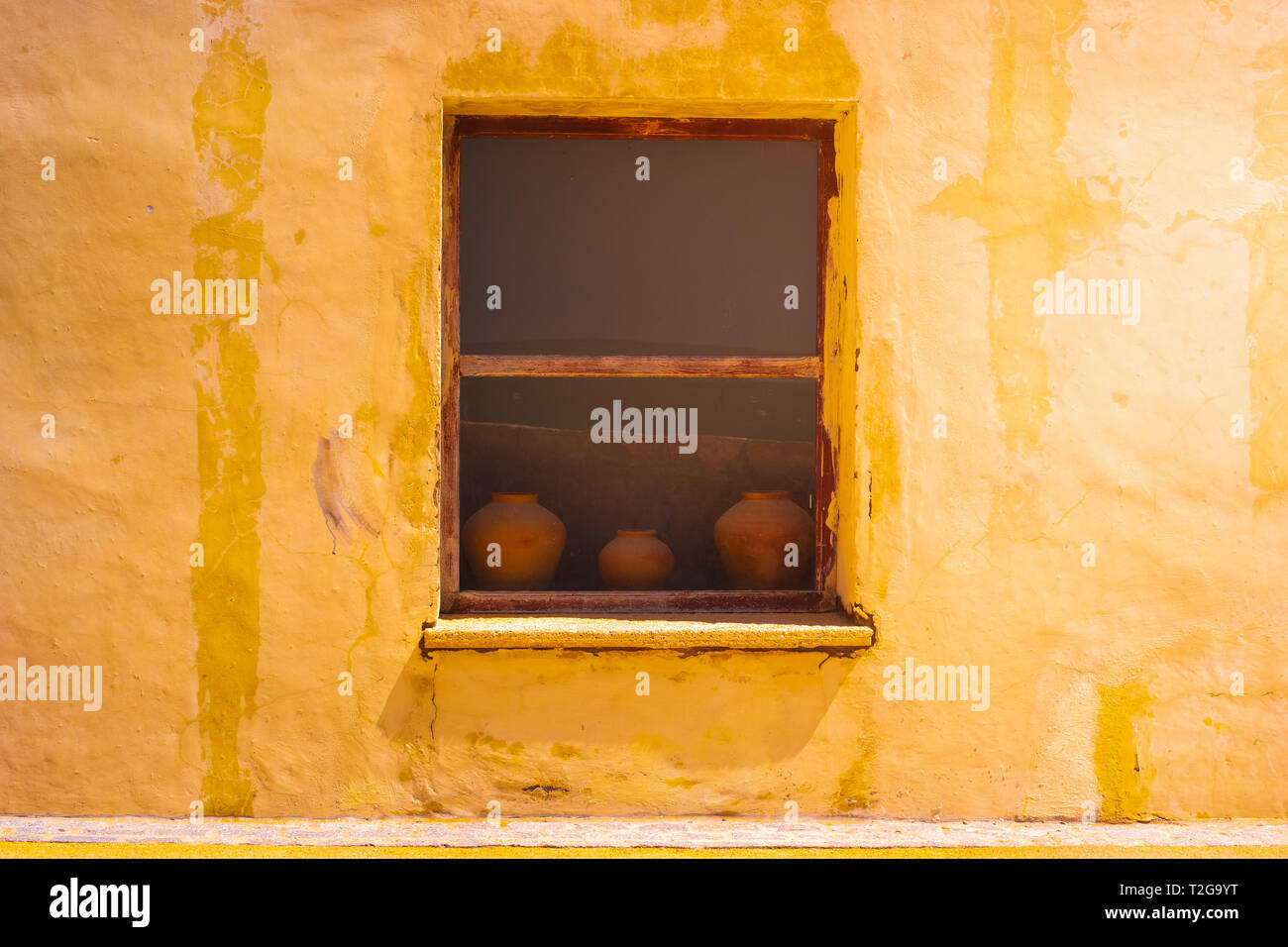 Old style pottery on the window background and copy space. Rural ...