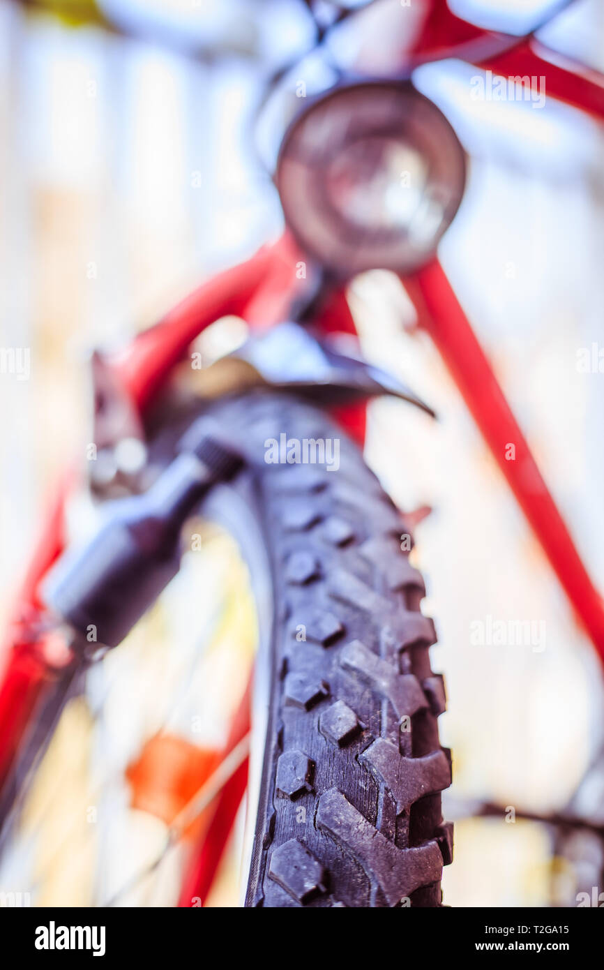 Close up picture of a mountain bike tyre, summer day Stock Photo - Alamy
