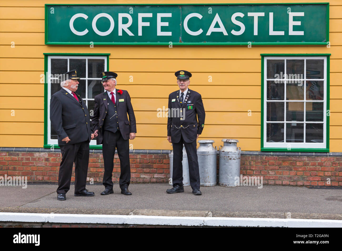 Station Masters standing on the platform outside the signal box of ...