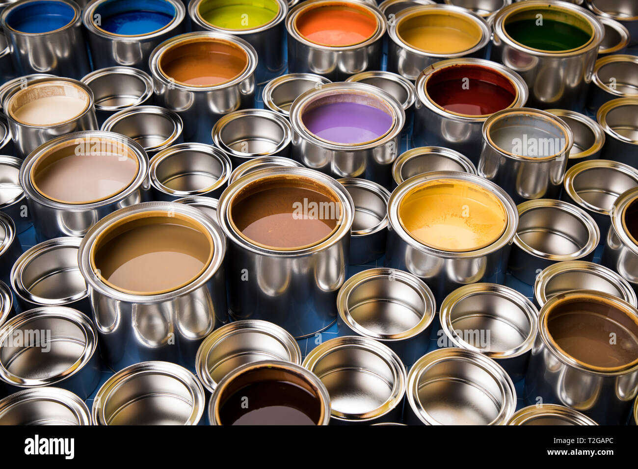 Full Buckets of rainbow colored oil paint Stock Photo - Alamy