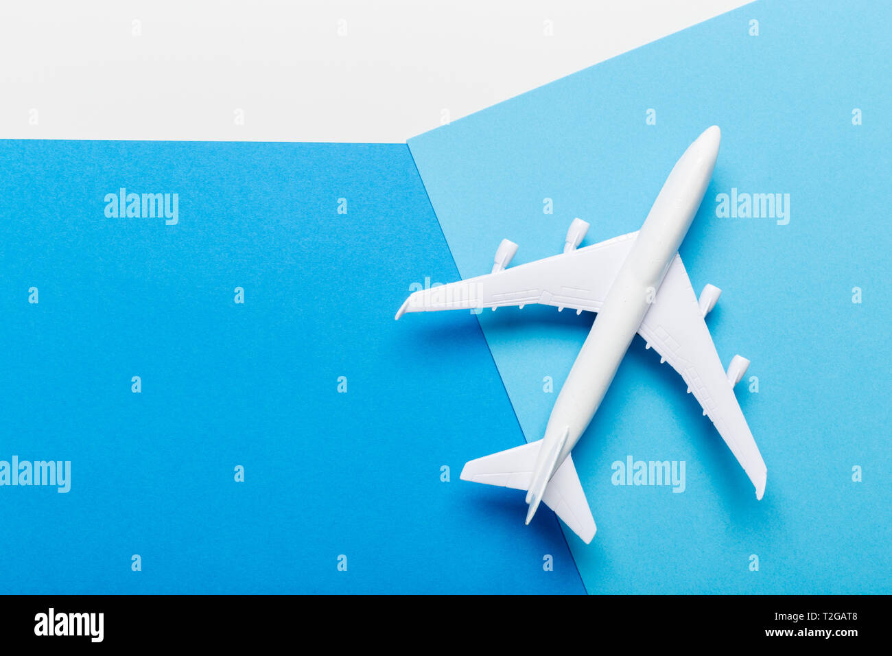 Miniature airplane travel theme Stock Photo - Alamy