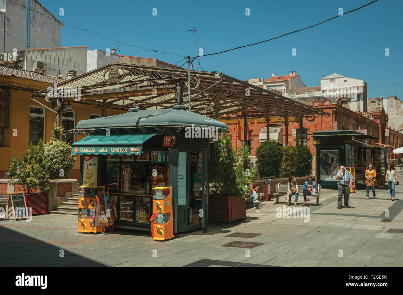 People walking on the street in front of the Calatrava Market at Merida ...