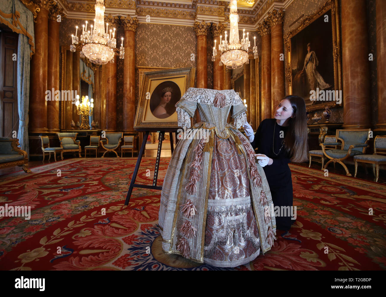 Buckingham palace staff arranging queen victorias stuart ball costume ...
