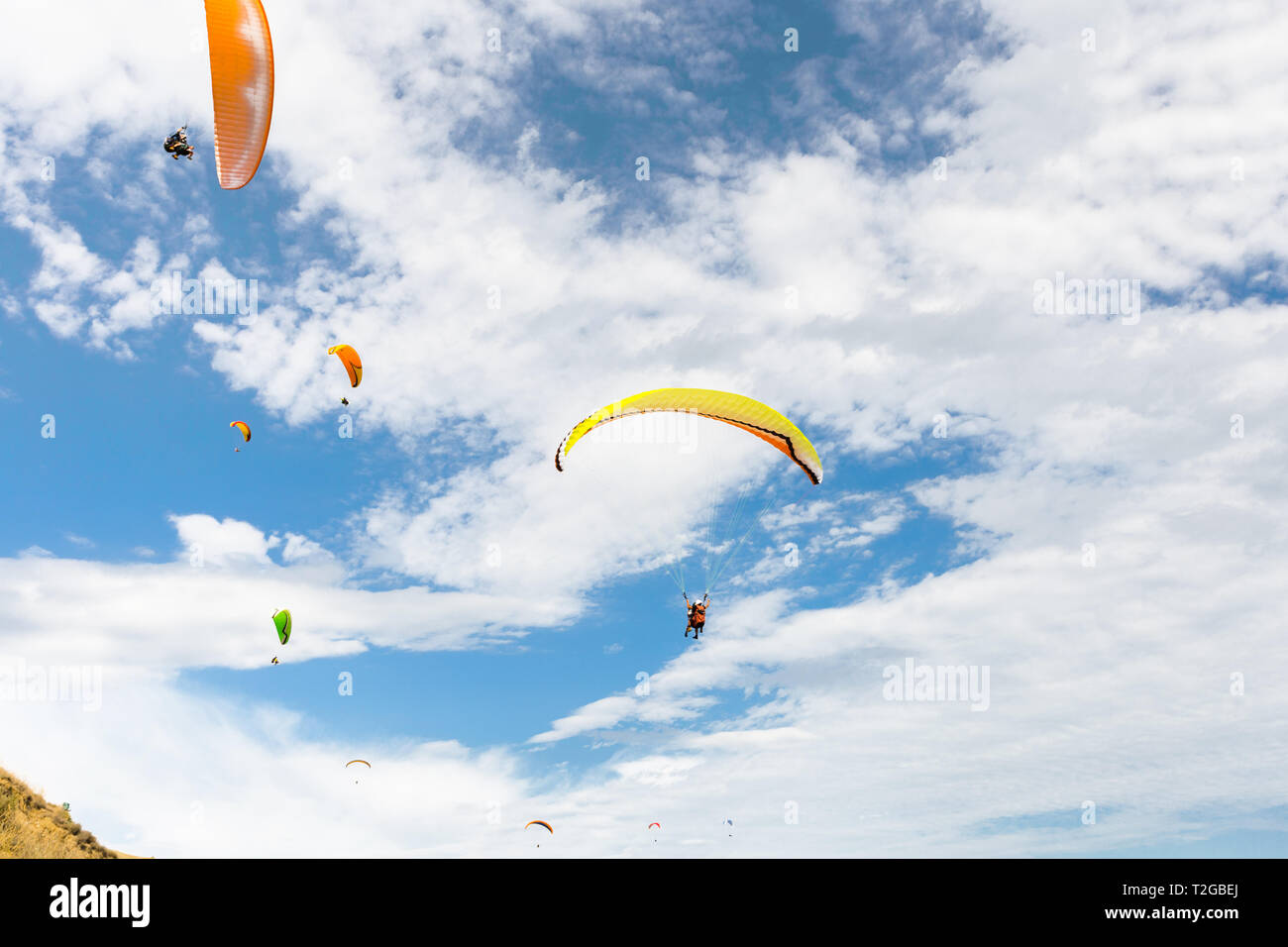 paraplane flying high up Stock Photo - Alamy