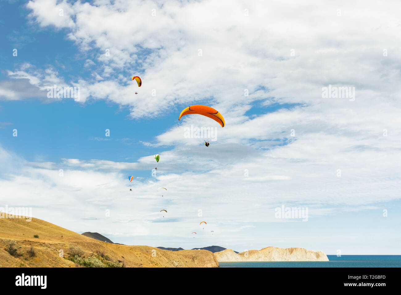 paraplane flying high up Stock Photo - Alamy