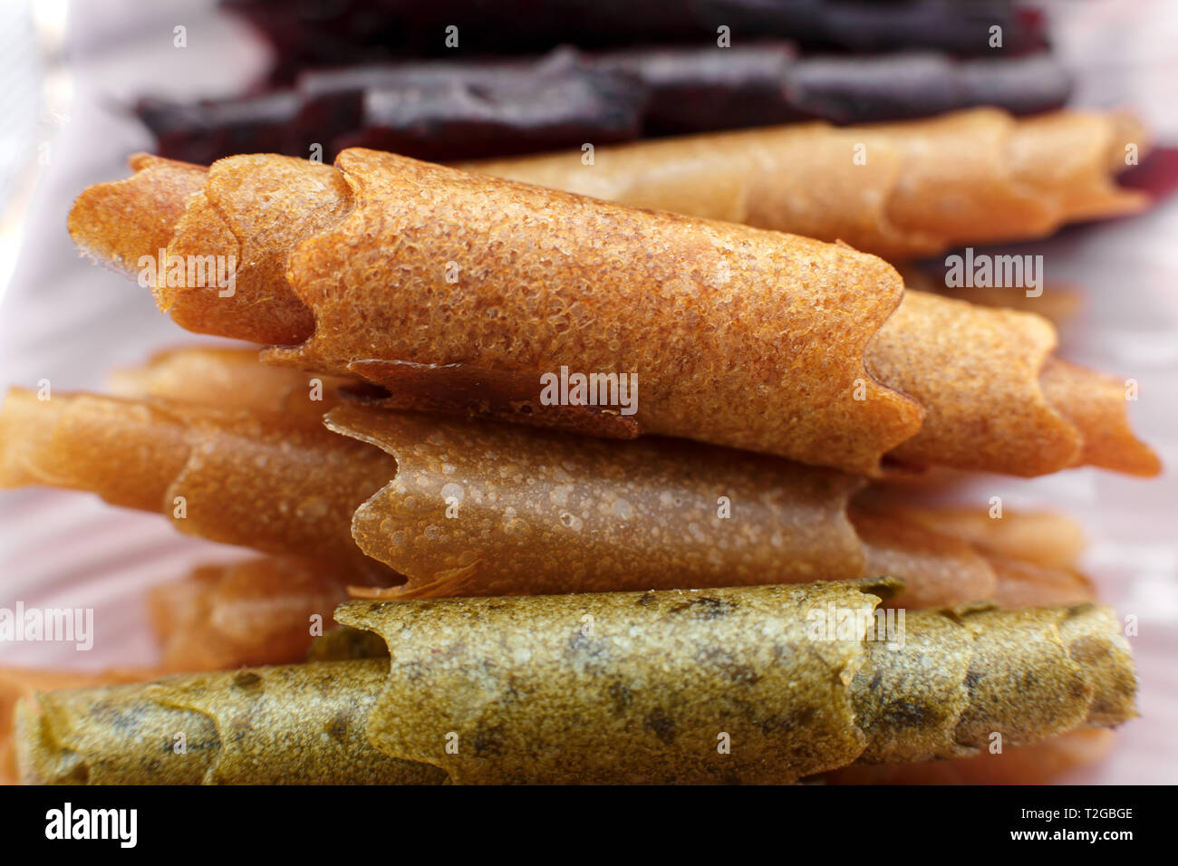 Closeup set of colorful pastillum rolls on tray Stock Photo - Alamy