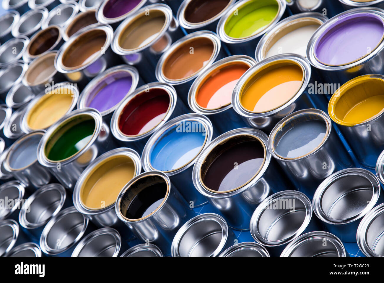 Concept group of tin metal cans with color paint Stock Photo - Alamy