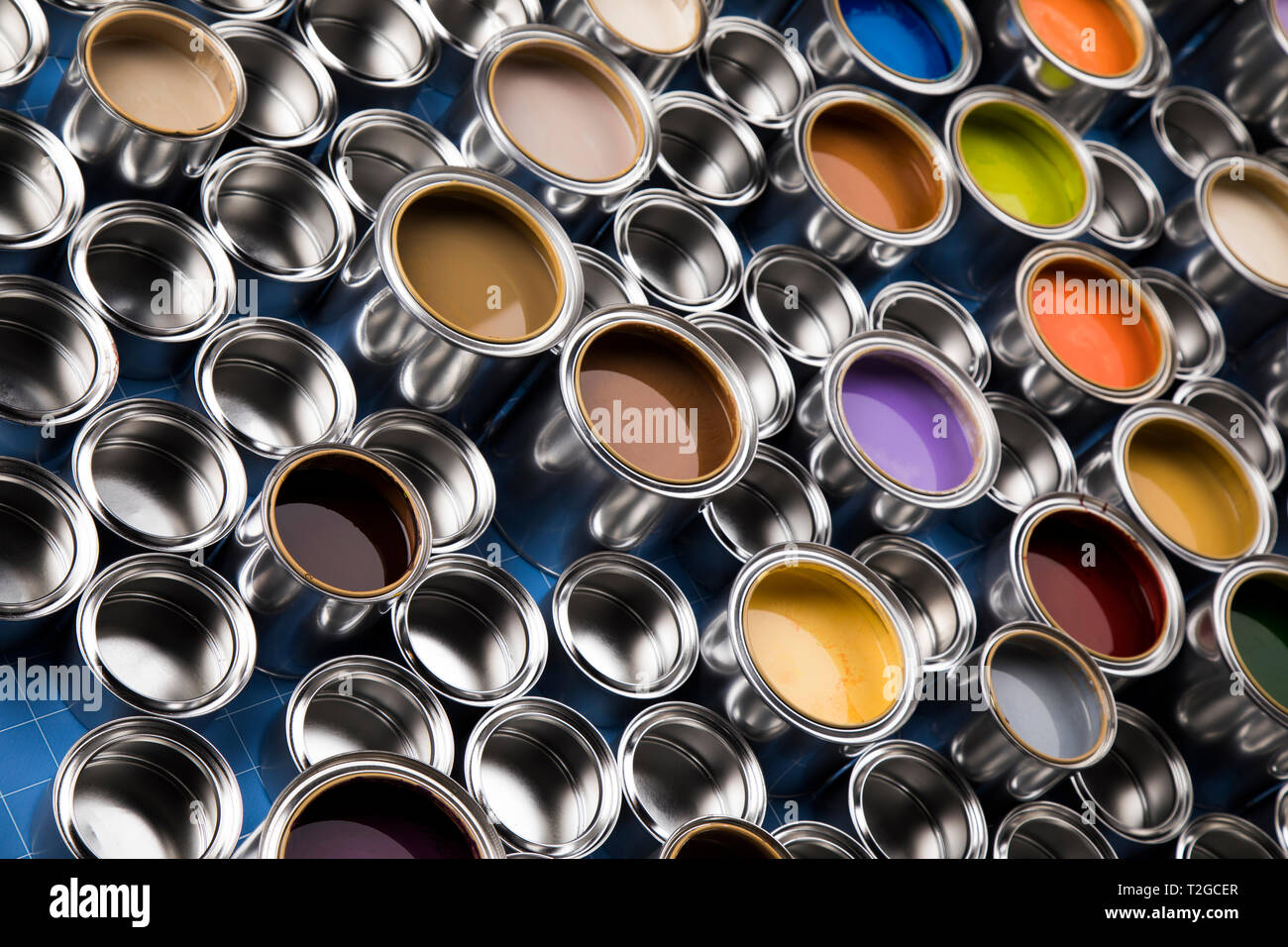 Metal cans with color paint Stock Photo - Alamy
