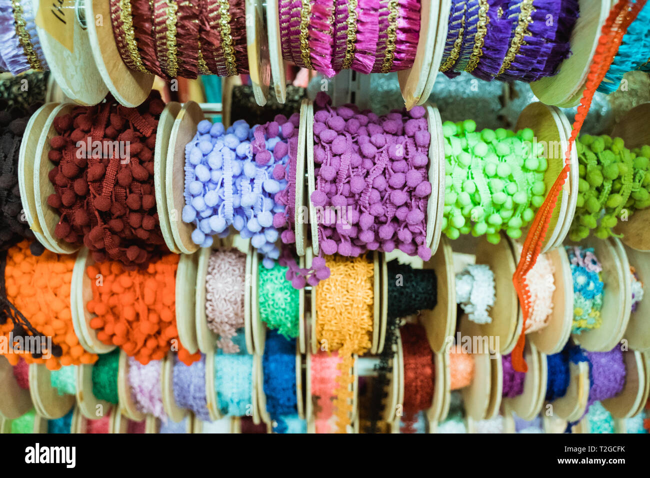 background of fabric decoration garments in the shop Stock Photo - Alamy