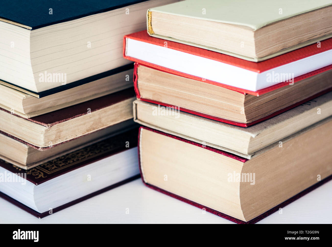 Stack of books education background, many books piles with copy space ...