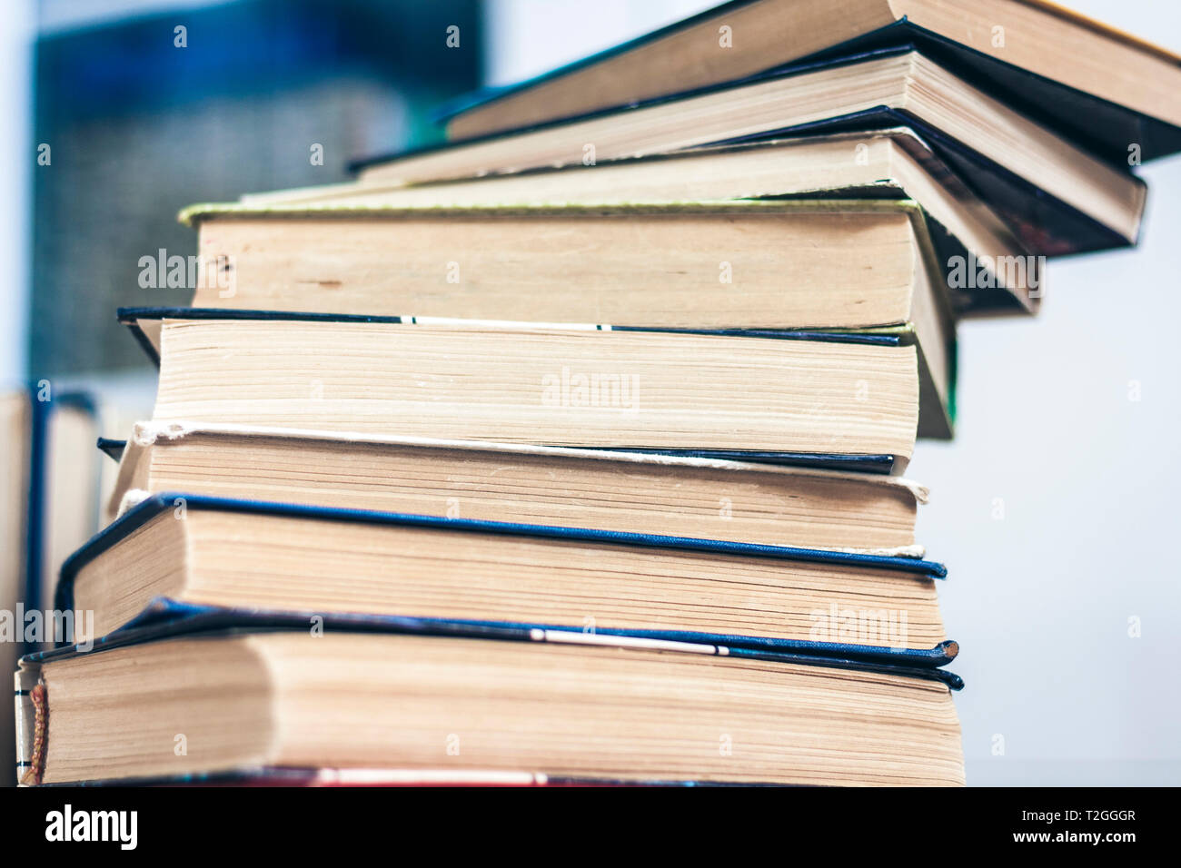 Stack of books education background, many books piles with copy space ...