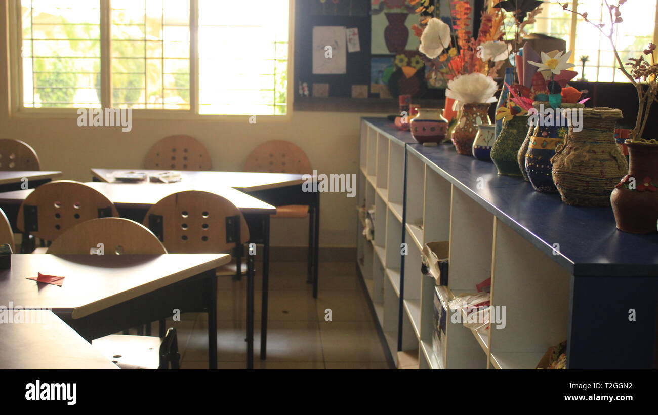 Decorated Painted Pots on shelf in Art Classroom Stock Photo - Alamy
