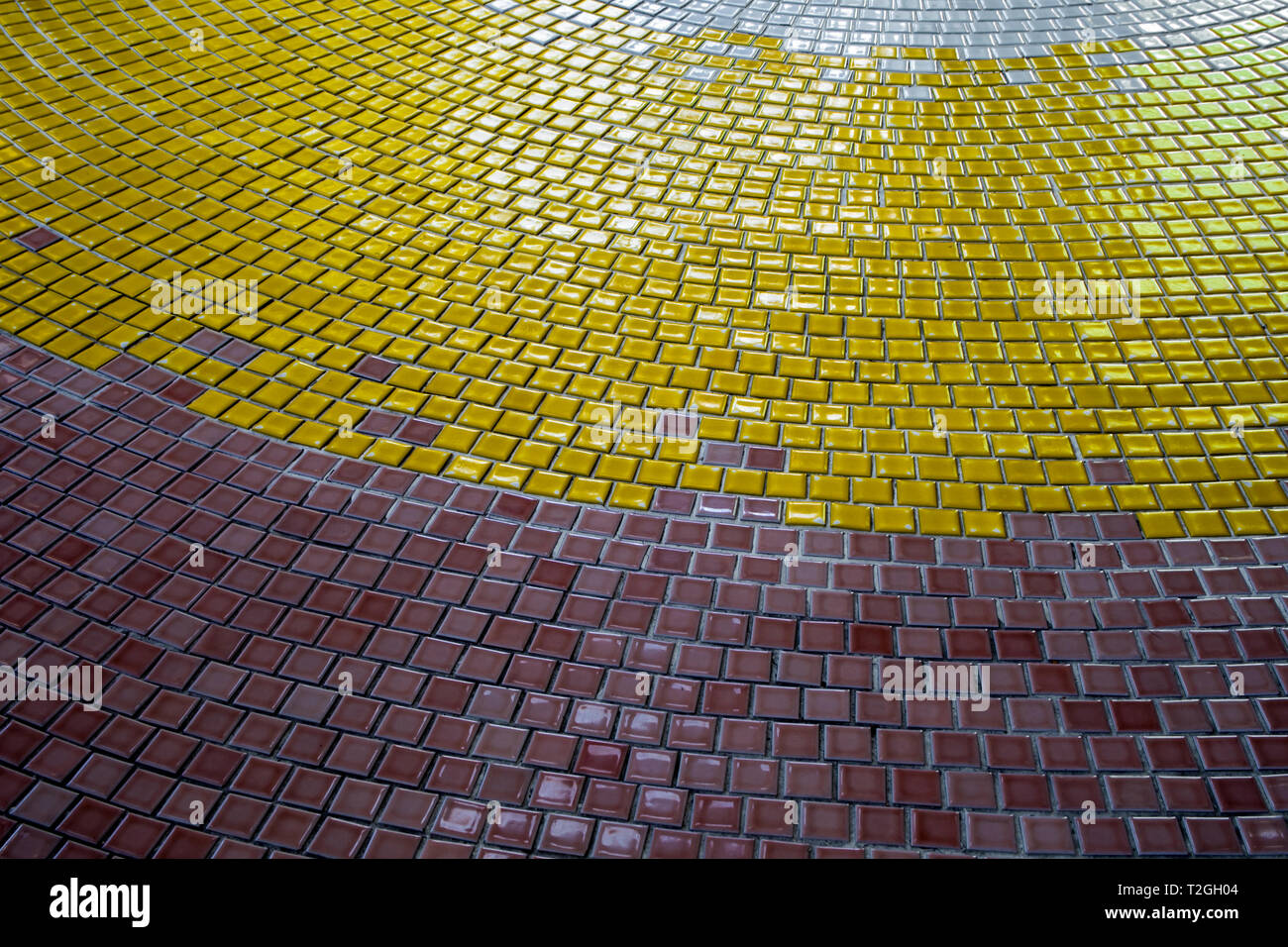 Yellow, White and Brown tiles on the floor of hall Stock Photo - Alamy