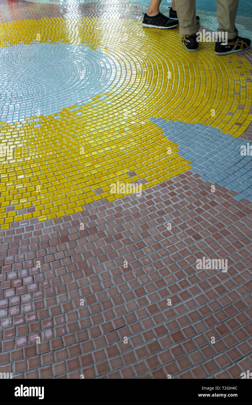 Yellow, White and Brown tiles on the floor of hall Stock Photo - Alamy
