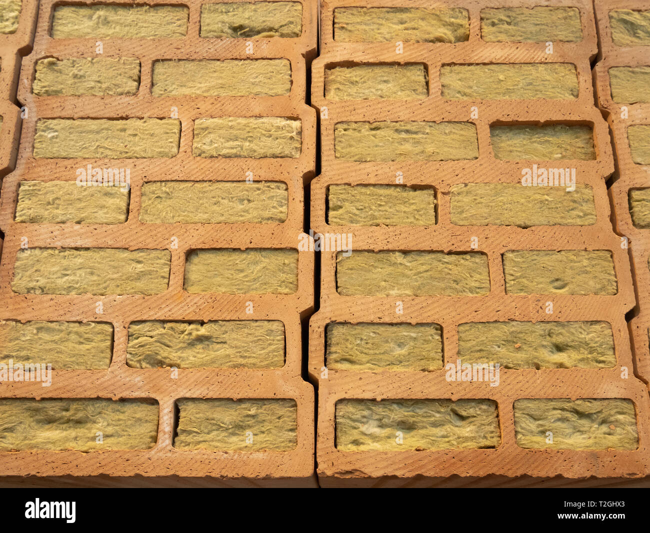 sample of wall made of hollow bricks with mineral wool for insulation ...