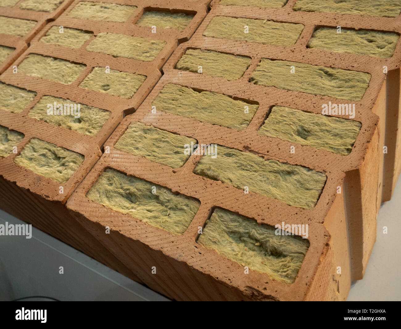 samples of red hollow bricks with mineral wool insulation. low angle ...