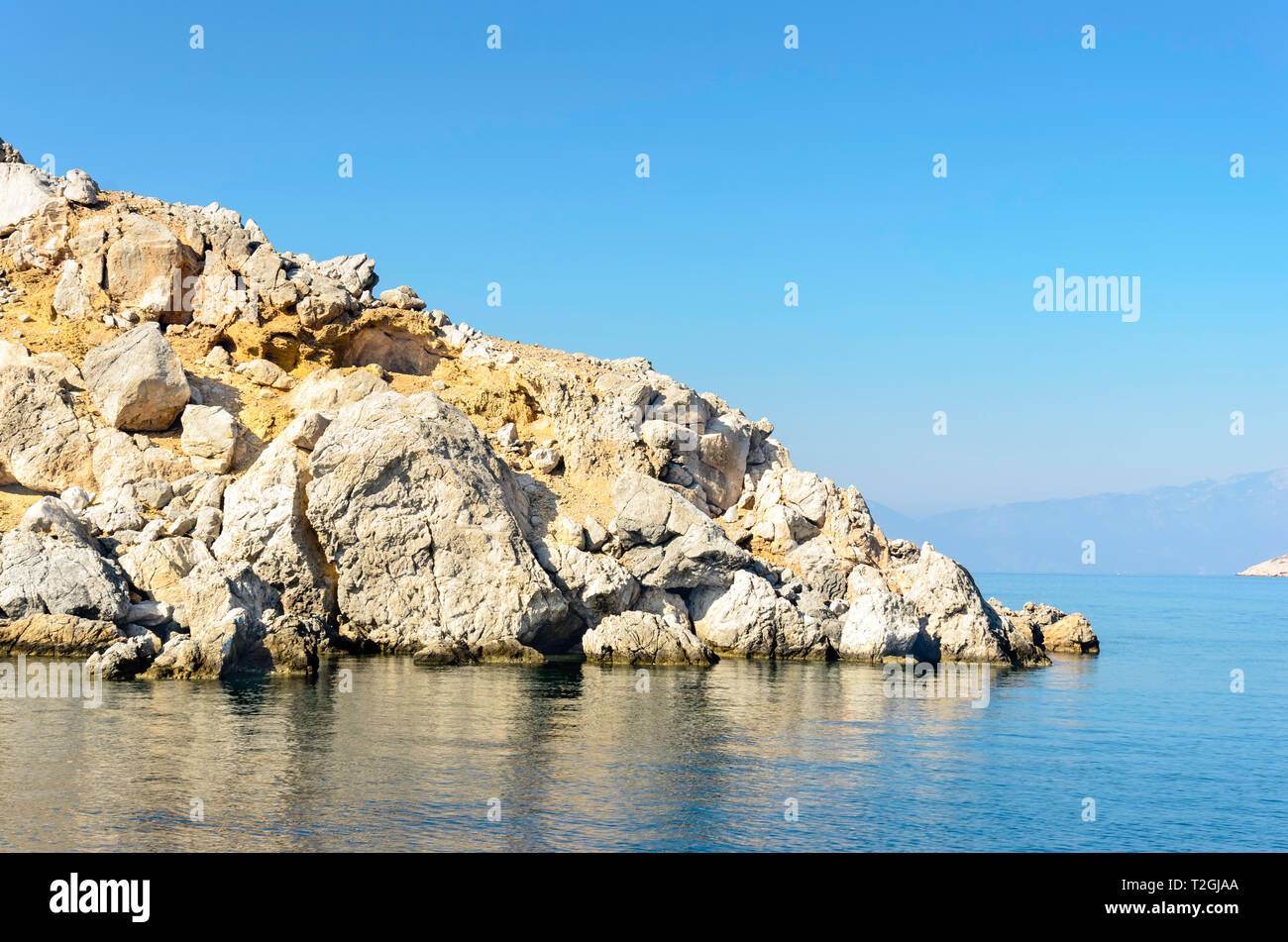 Rock by the sea Stock Photo - Alamy