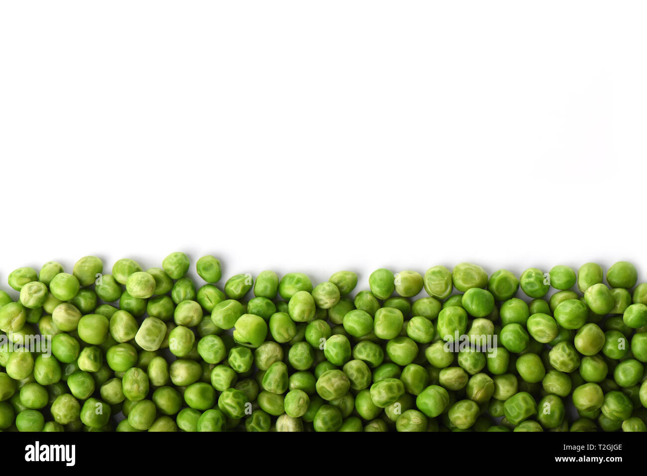 Green peas isolated on a white background. Horizontally. Copy space ...