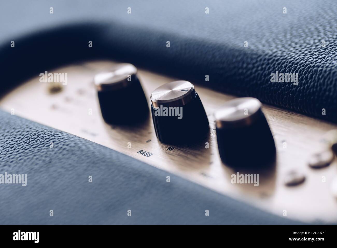 Bass control knob on music amplifier equalizer Stock Photo - Alamy